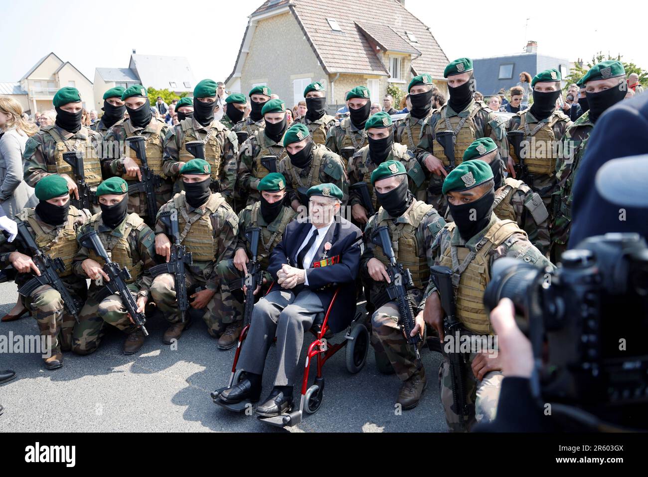 French WWII veteran of the Commando Kieffer Leon Gautier, center, poses ...