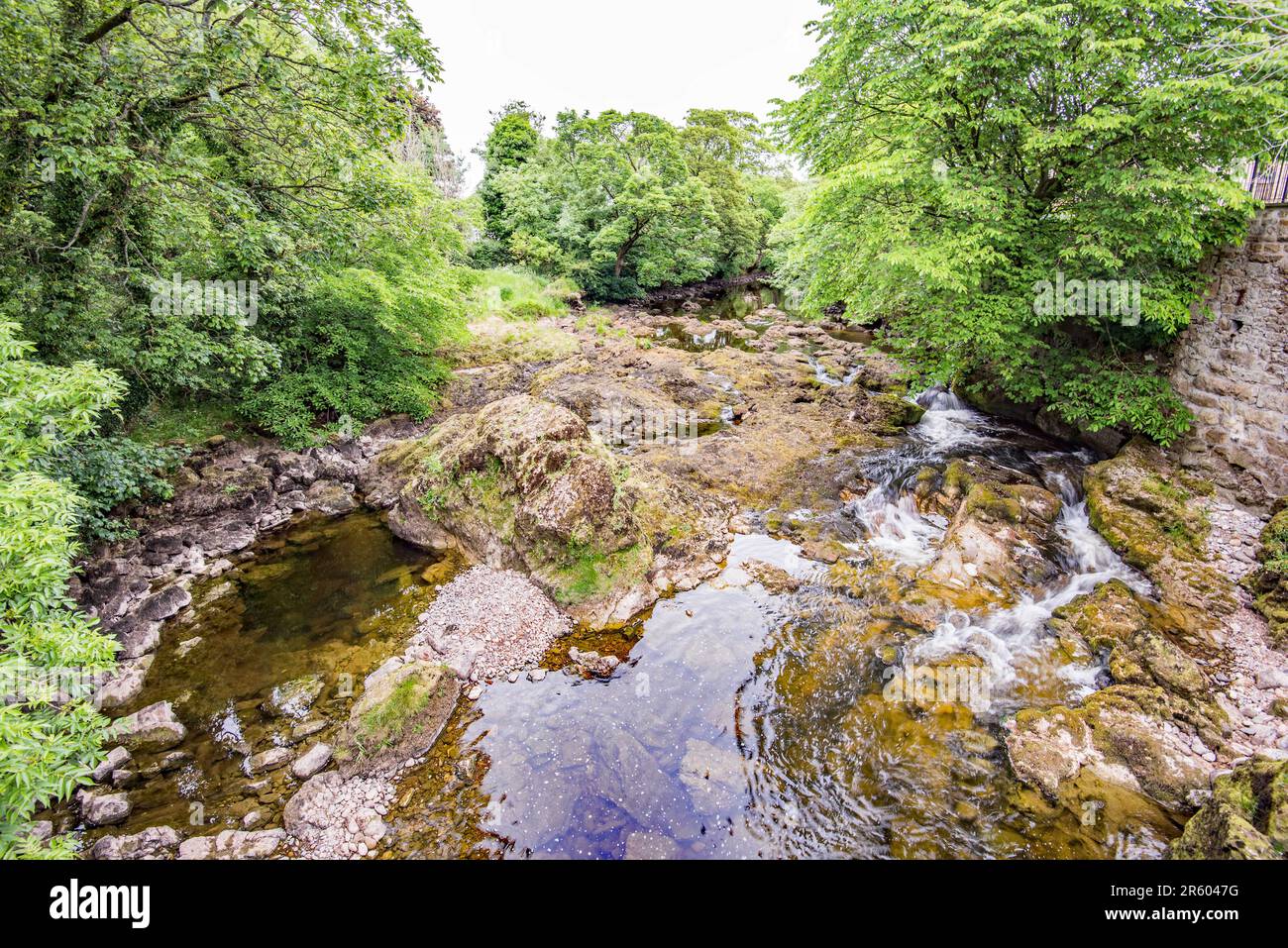 Queens Rock, Settle, North Yorkshire in the River Ribble during a dry ...