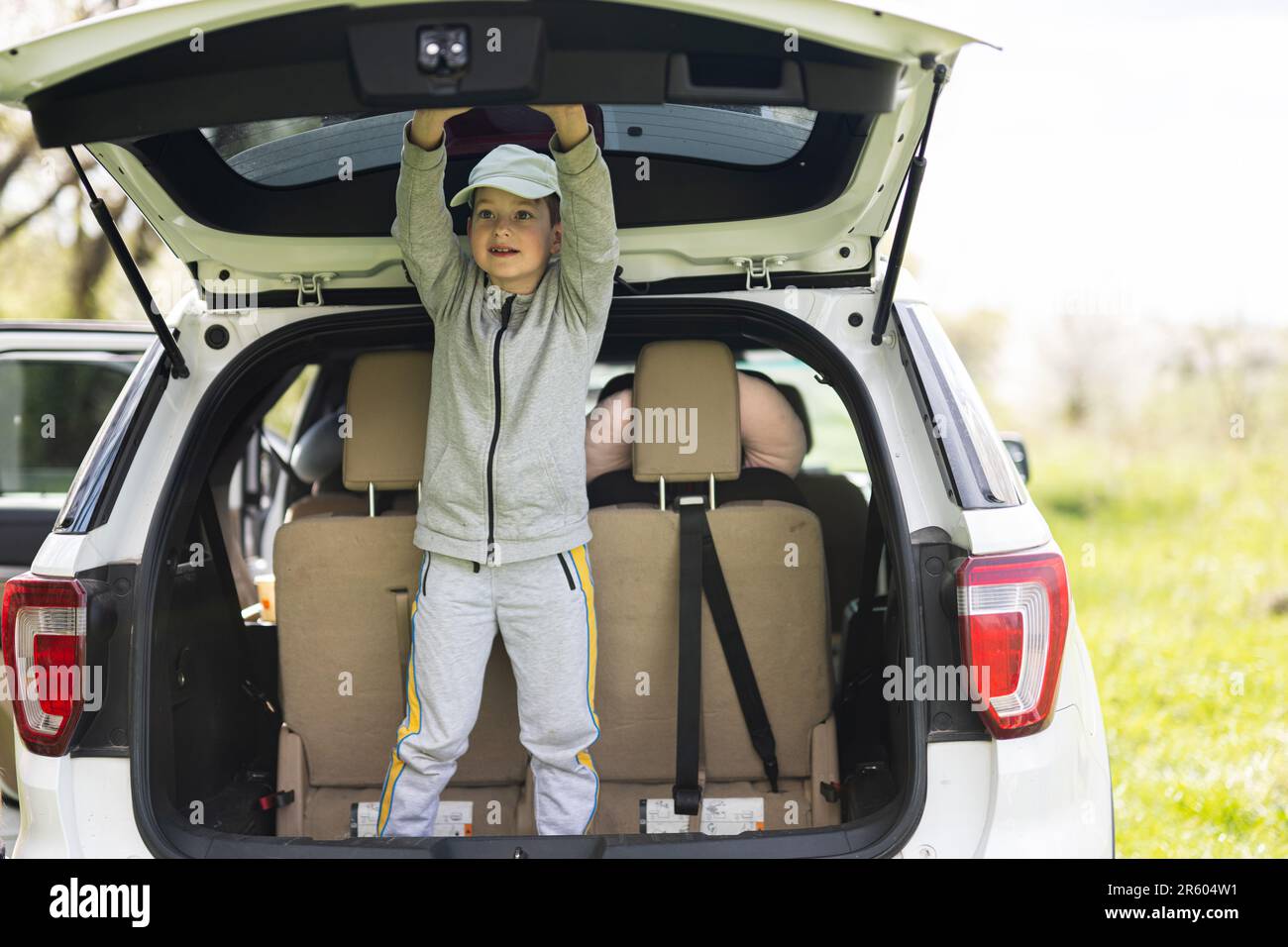 Boy inside car hi-res stock photography and images - Alamy