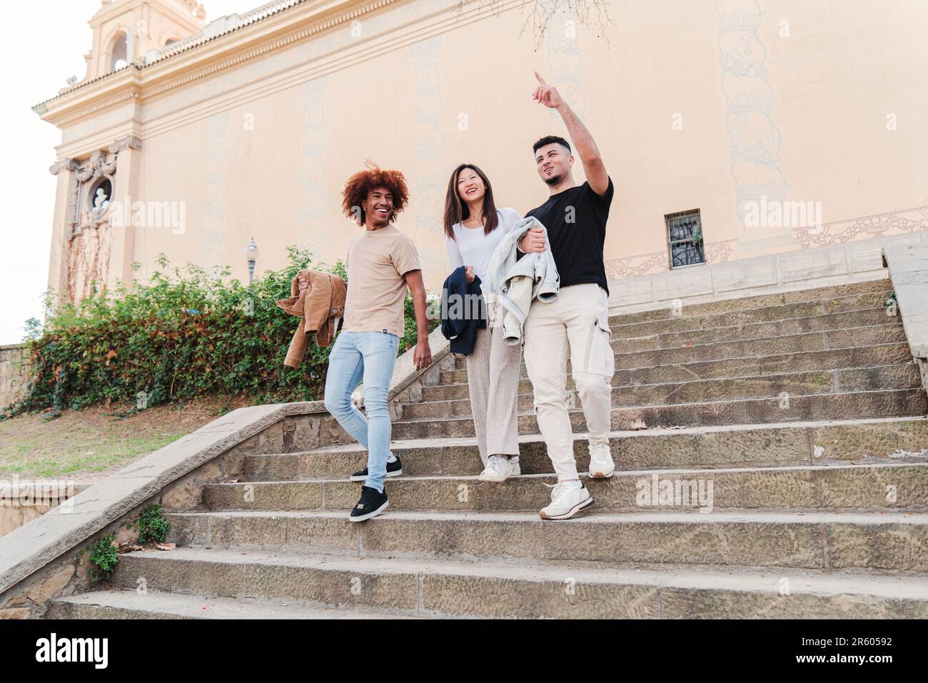 Diverse young people walking downstairs hi-res stock photography and ...