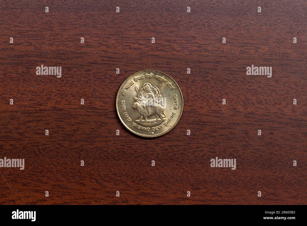Maa Vaishno devi Indian currency coins Stock Photo - Alamy