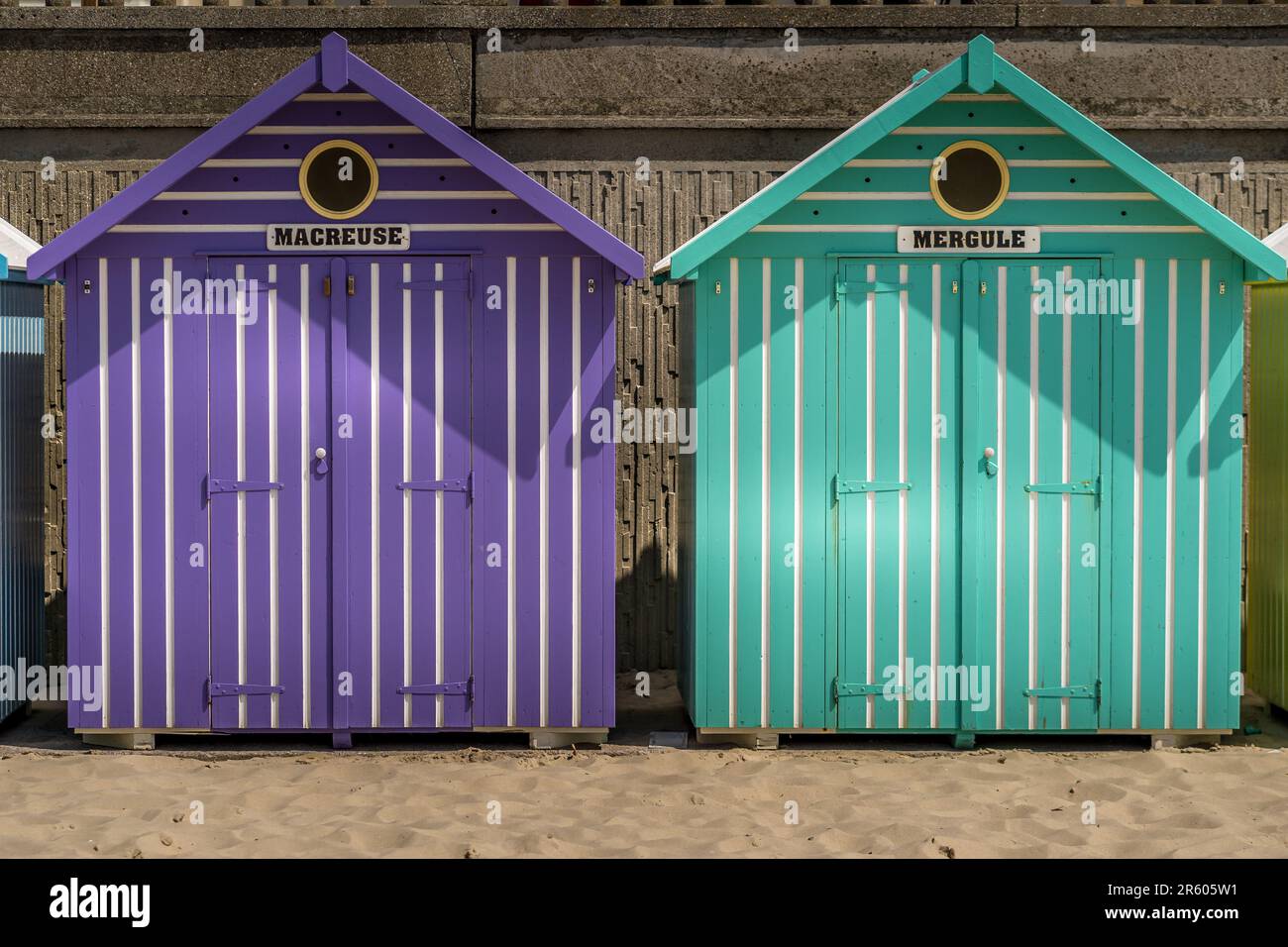 Wooden colorful beach huts at the northern French beach, lavender ...