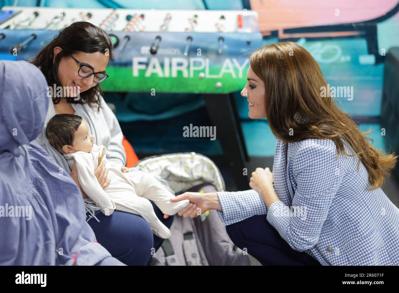 The Princess of Wales meets a mother and baby during a visit to the ...