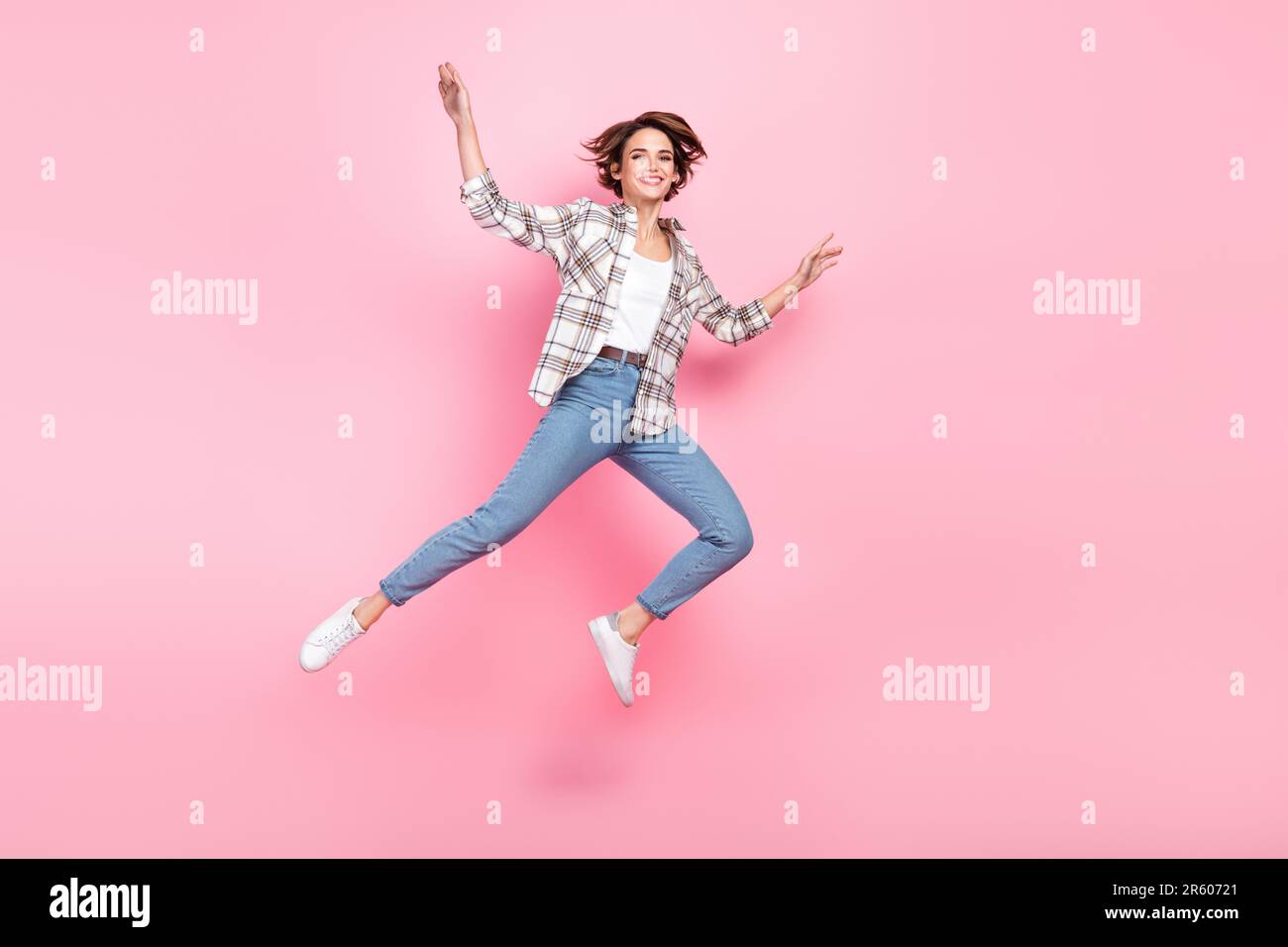 Full body portrait of overjoyed nice lady jumping fly have good mood ...