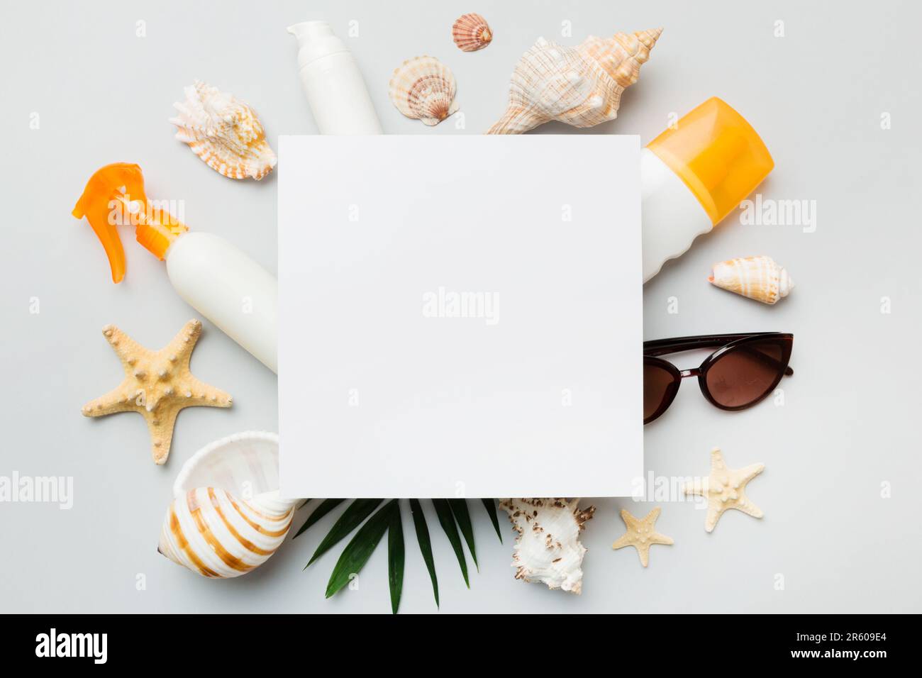 Summer time concept with blank greeting card and blank white paper on ...