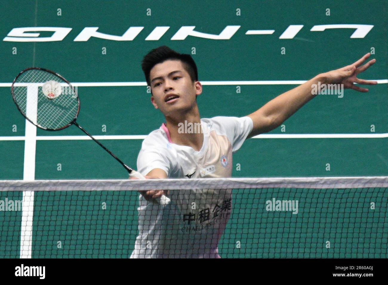 Singapore. 6th June, 2023. Lee Chia Hao of Chinese Taipei hits a return against Nishimoto Kenta ...