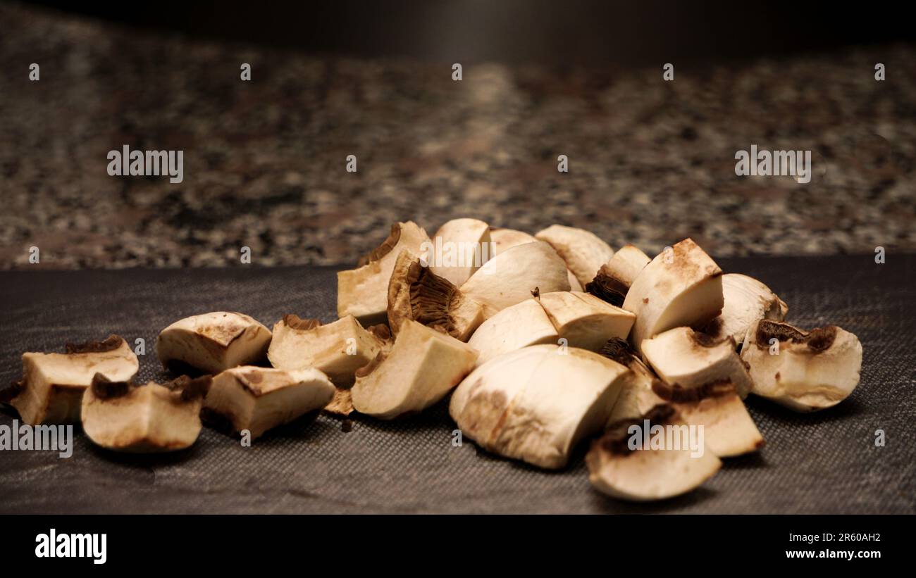 Sliced champignon mushrooms cooked in hi-res stock photography and ...