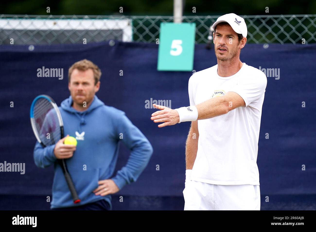 Great Britain's Andy Murray (right) as LTA coach Mark Hilton looks on ...