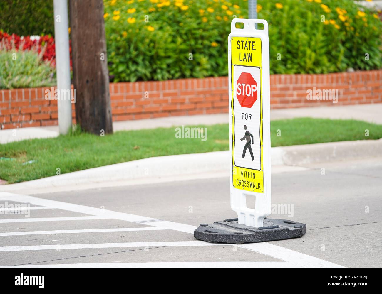 Safety signs and painted crosswalk hi-res stock photography and images ...