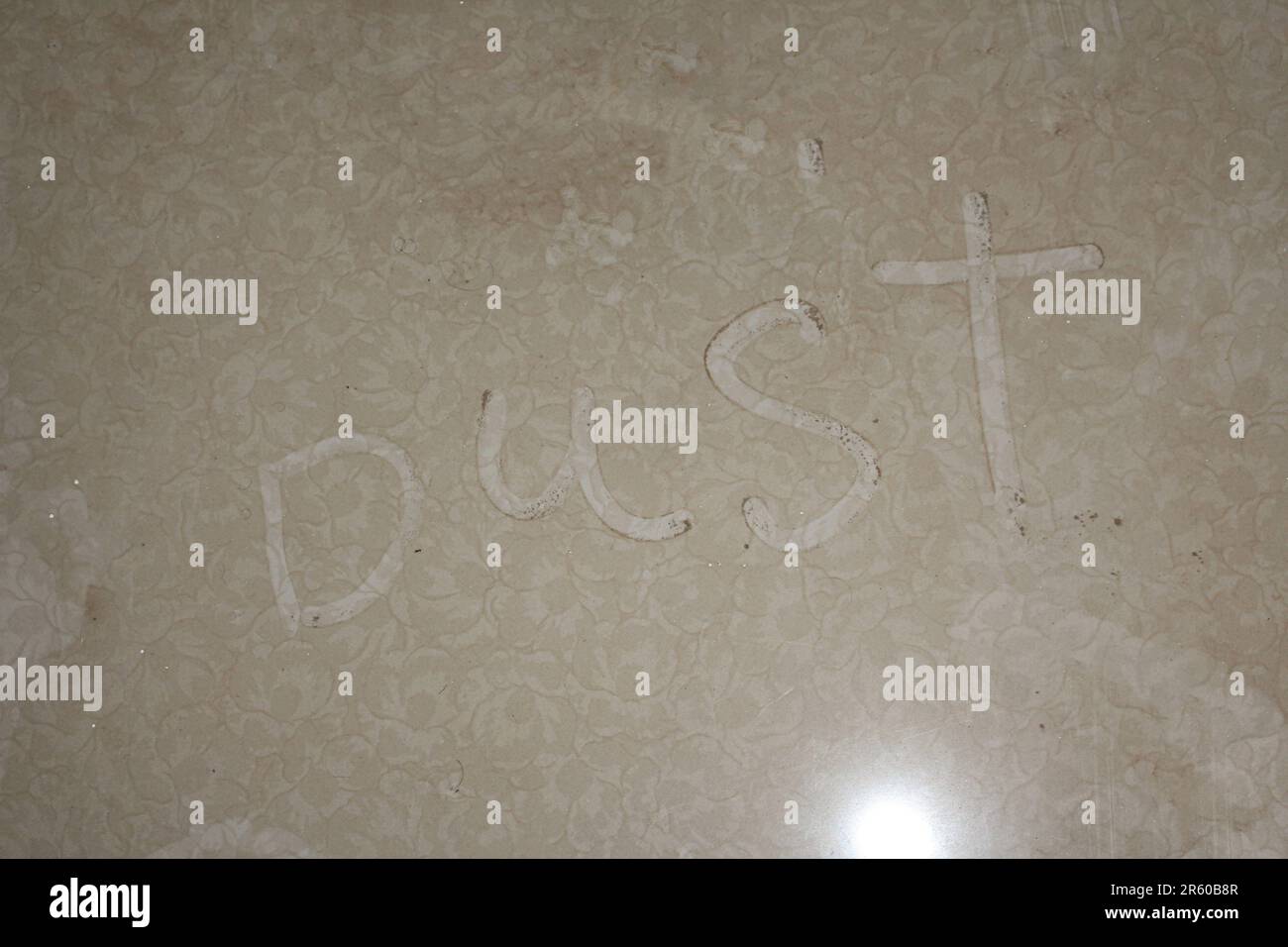 Dust written on dusty floor Stock Photo - Alamy