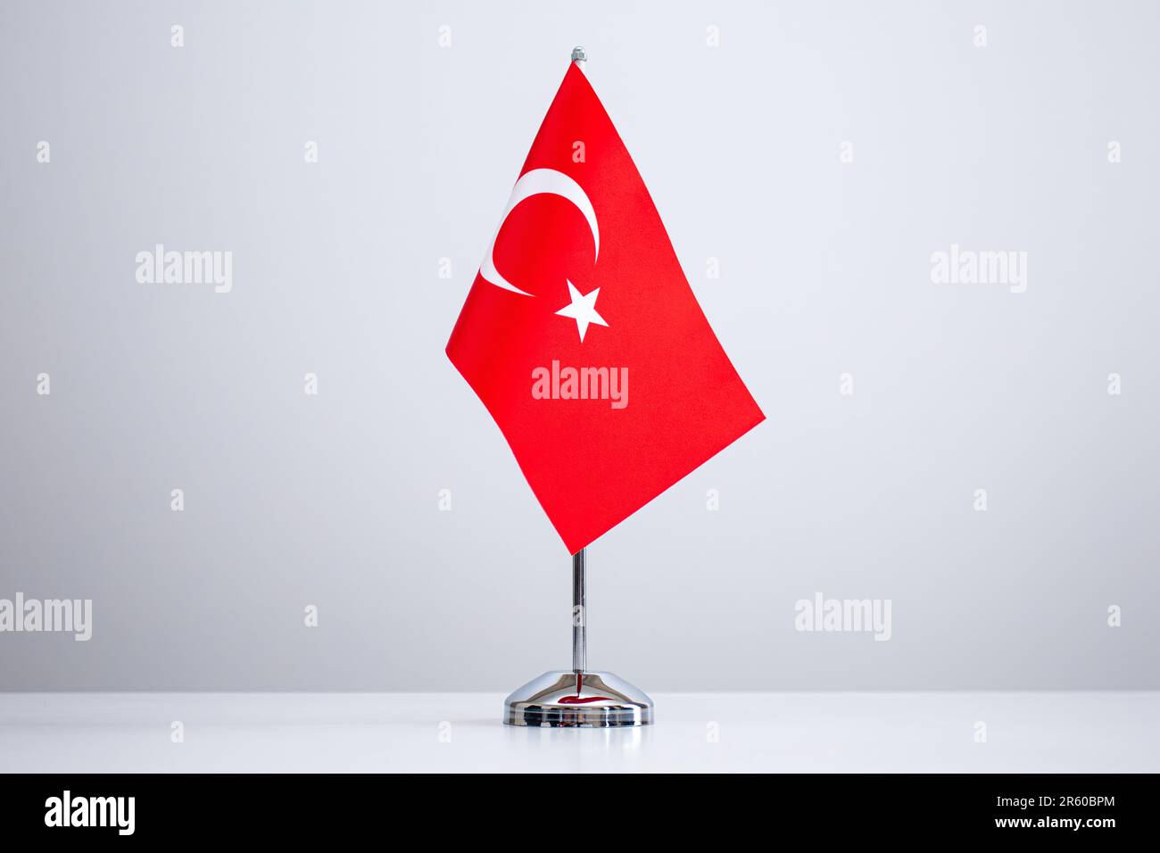 Small national flag of the Turkey on a white background Stock Photo - Alamy