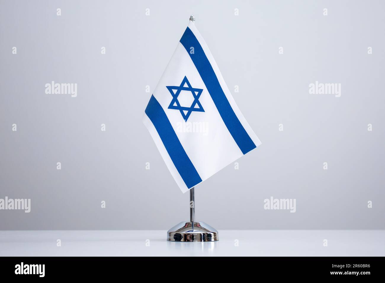 Small national flag of the Israel on a white background Stock Photo - Alamy