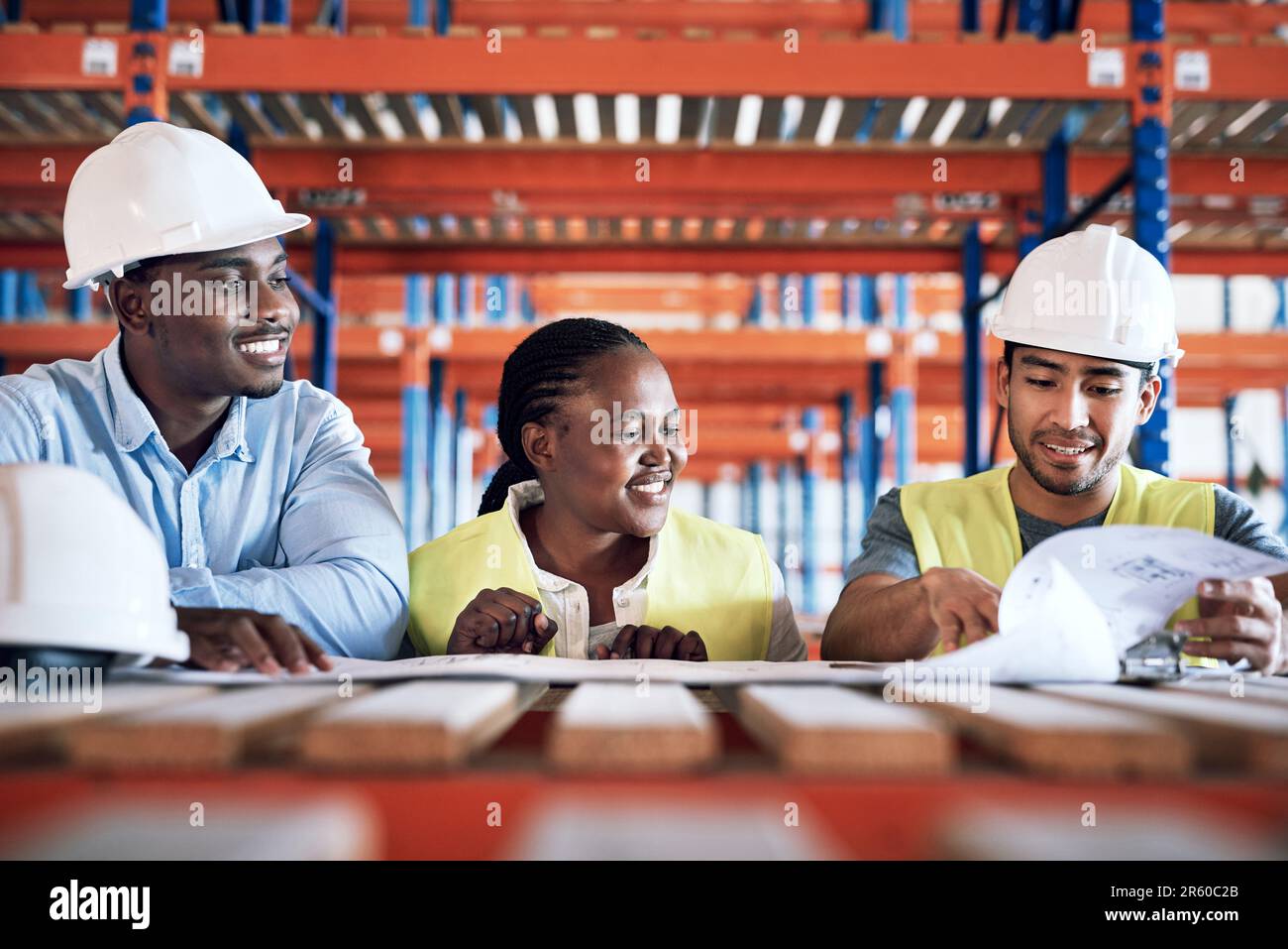 Architect, team and blueprint documents for construction, strategy or ...