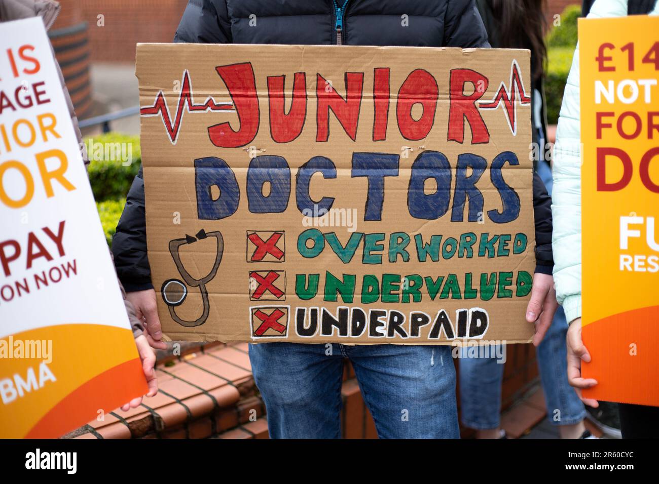 Junior doctors and members of the British Medical Association holding ...