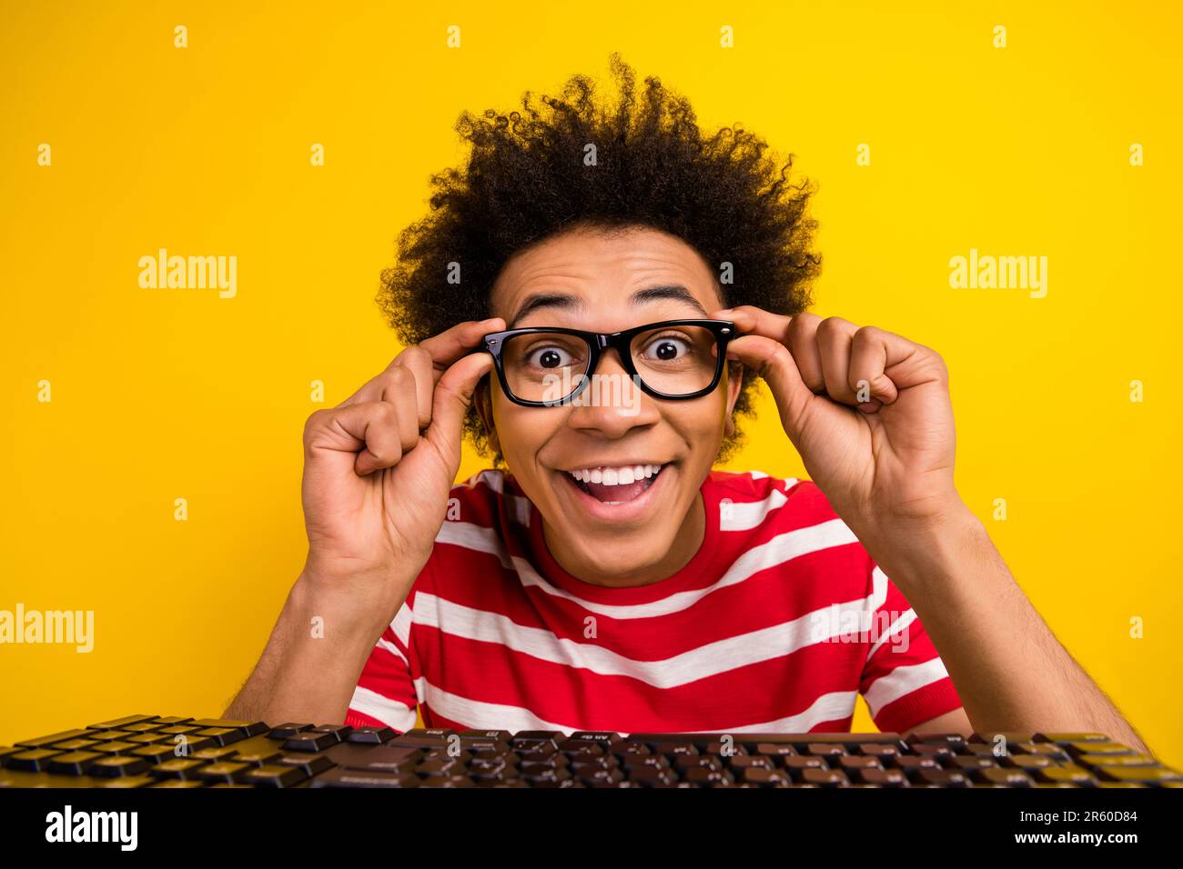 Portrait cheerful funky person hands touch eyeglasses beaming smile pc ...