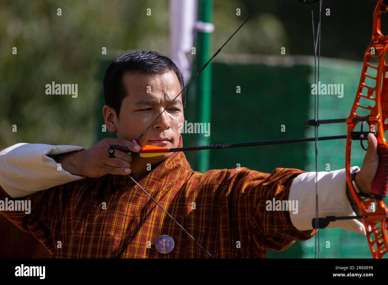 Archery competition in Thimphu, Bhutan. Archery is the national sport ...