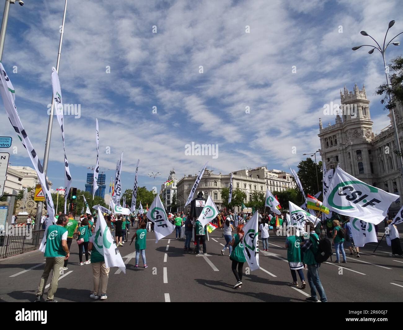 A picture of a diverse crowd of people standing in a street, each ...