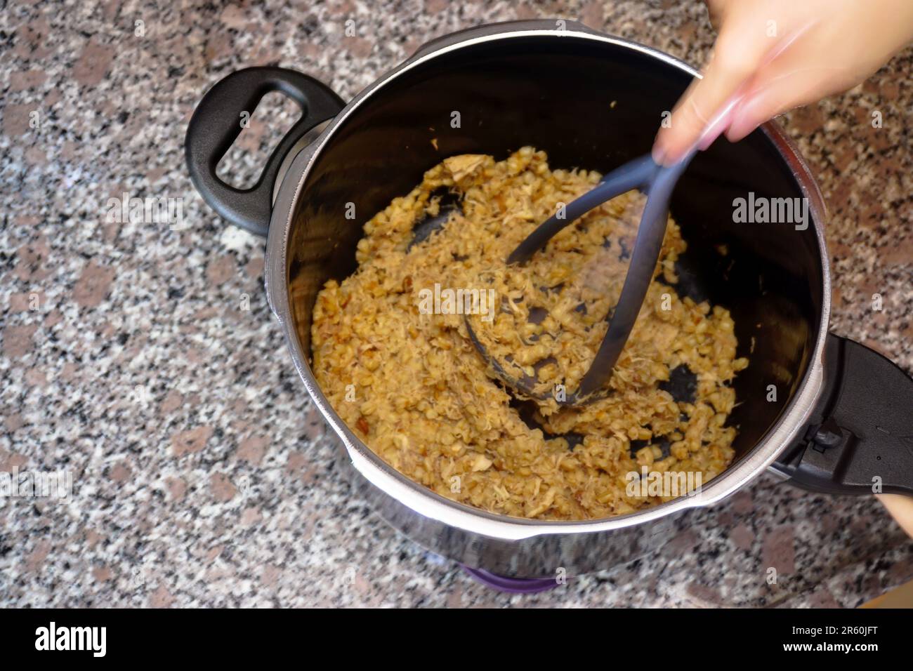 Famous Ottoman meal Keskek made with grain and chicken at home in the ...