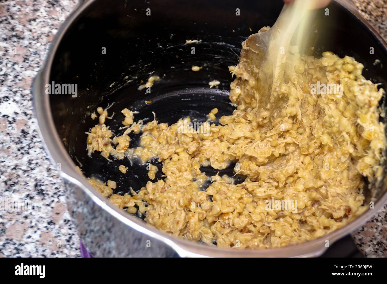 Famous Ottoman meal Keskek made with grain and chicken at home in the ...