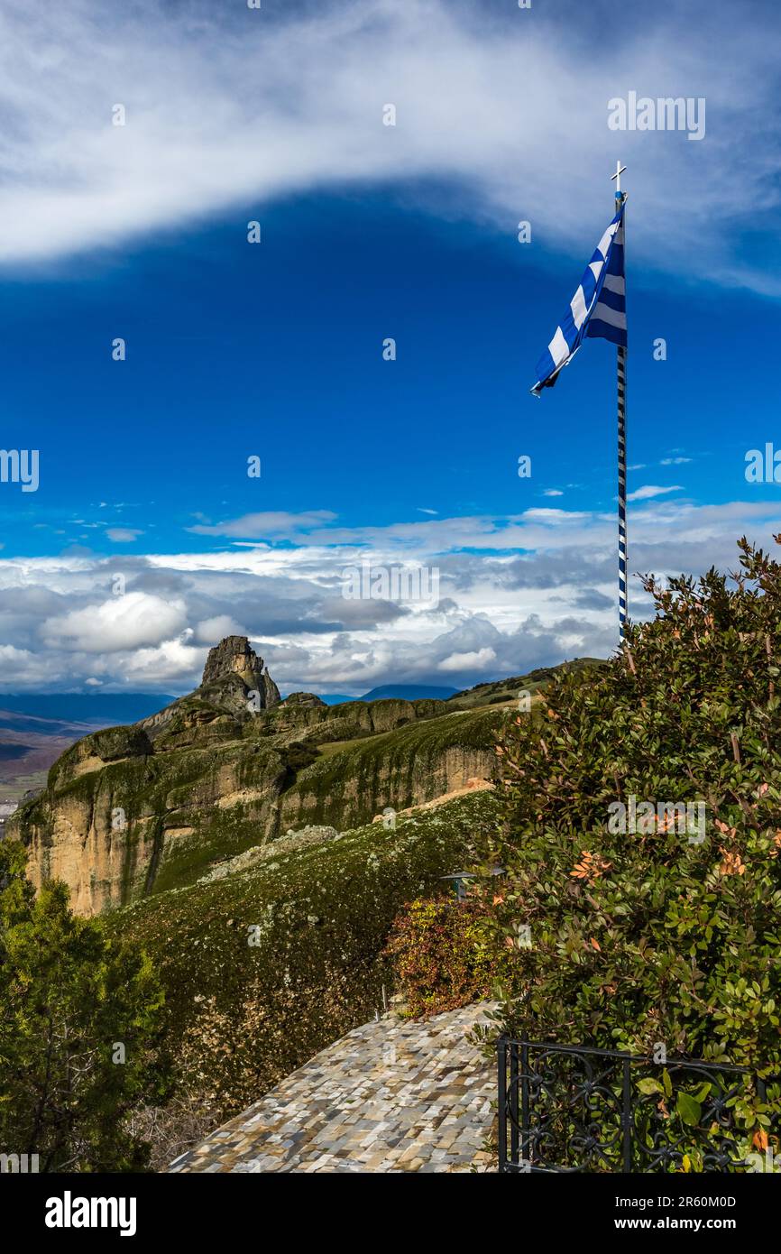 The Greek flag on a tall pole. Meteora, Greece, majestic view from the ...