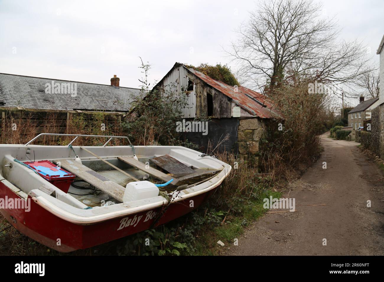 old boat old barn Stock Photo - Alamy