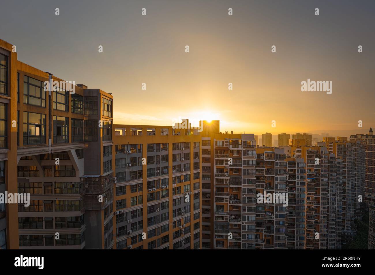 In the morning, the sunlight shone on the residential buildings in the ...