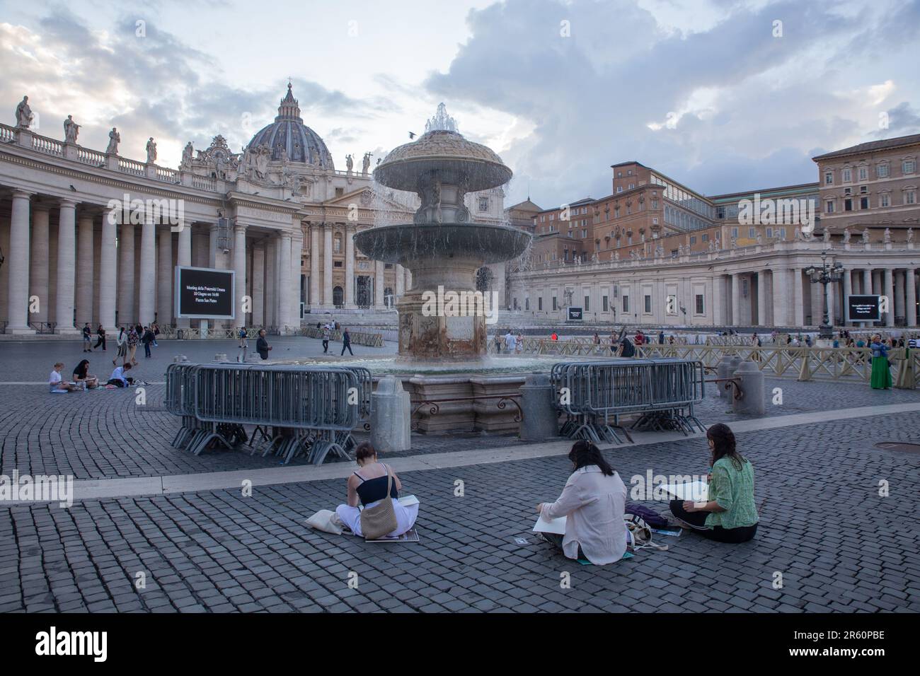 Some girls paint sitting in St. Peter's Square in Rome (Photo by Matteo ...