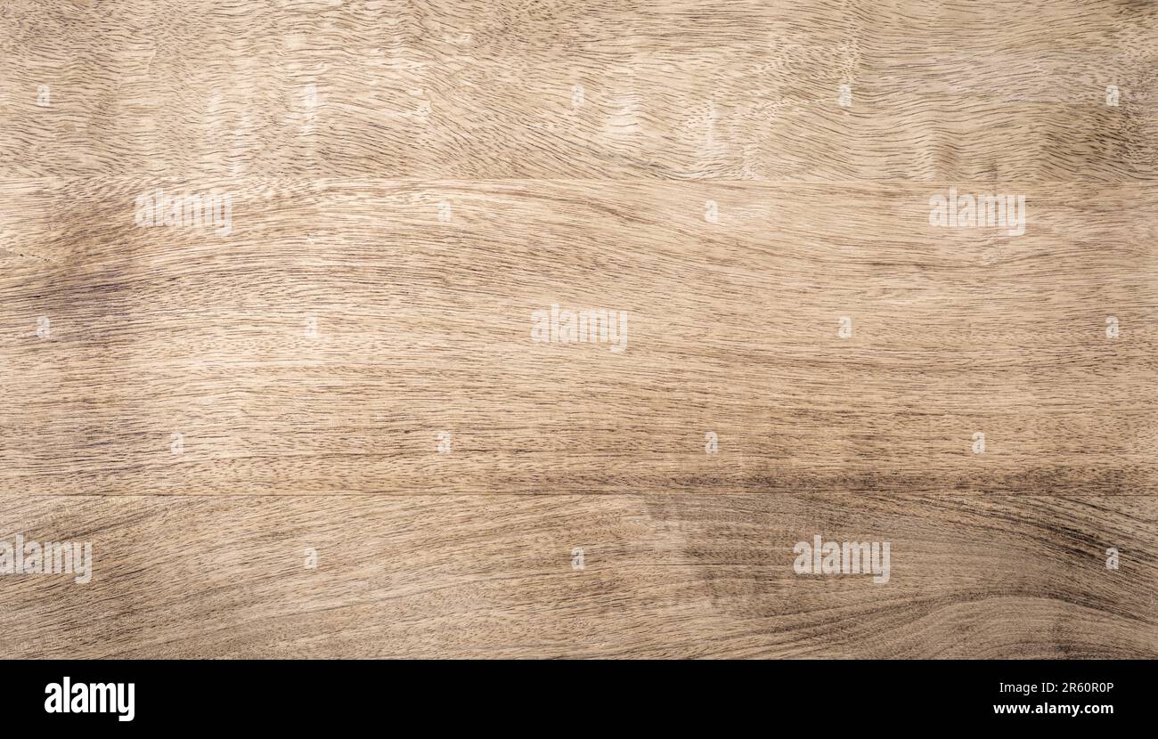 Light brown rough grainy mango wood texture background Stock Photo - Alamy