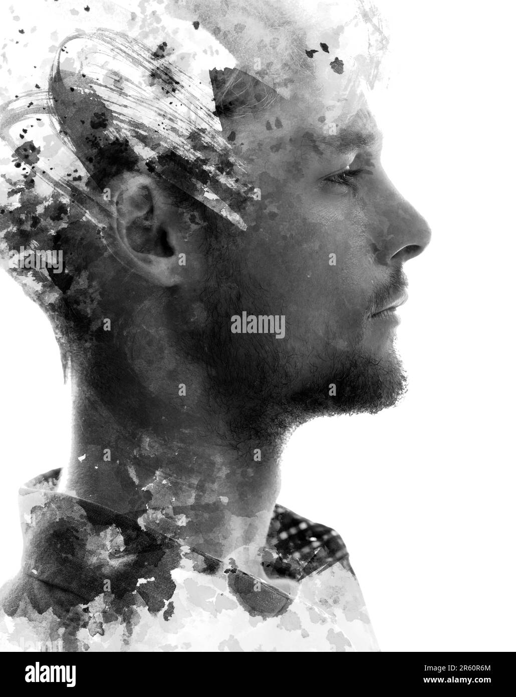 A paintography man's profile portrait with paint splashes and brush ...