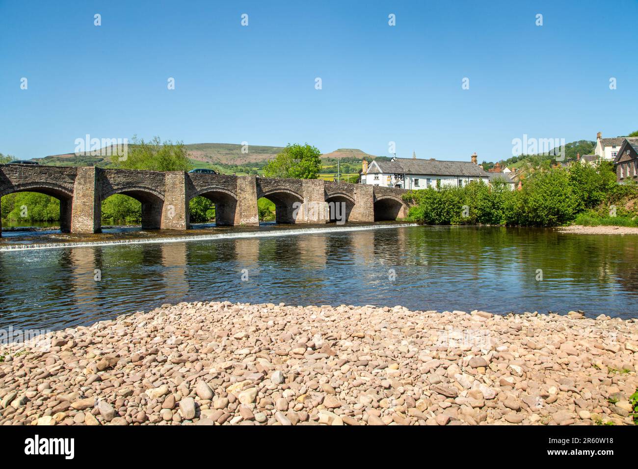 The river Usk flowing under the ancient Crickhowell Bridge in the South ...