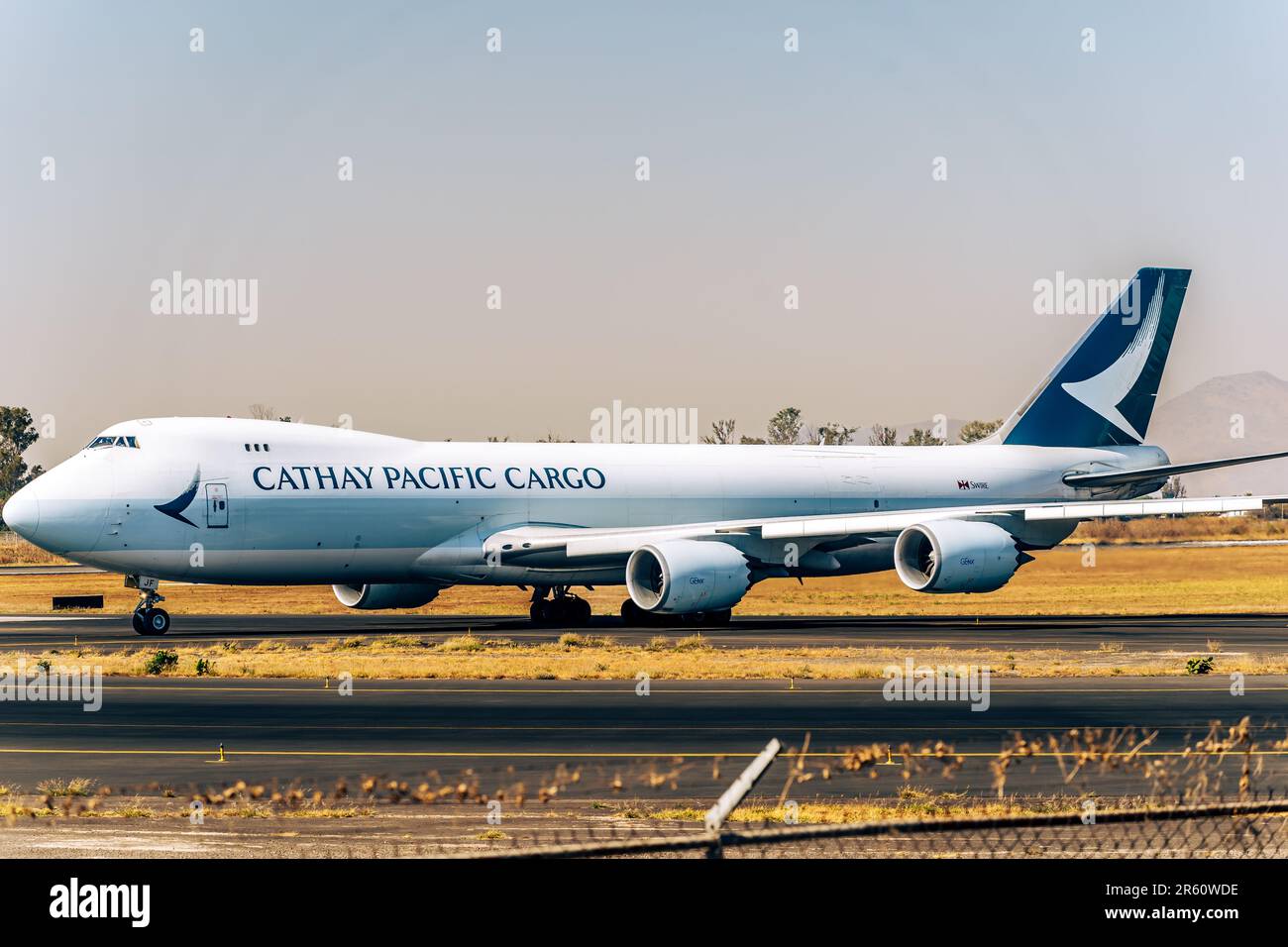 Cathay Pacific Cargo Boeing B747-8 lining up for departure Stock Photo ...