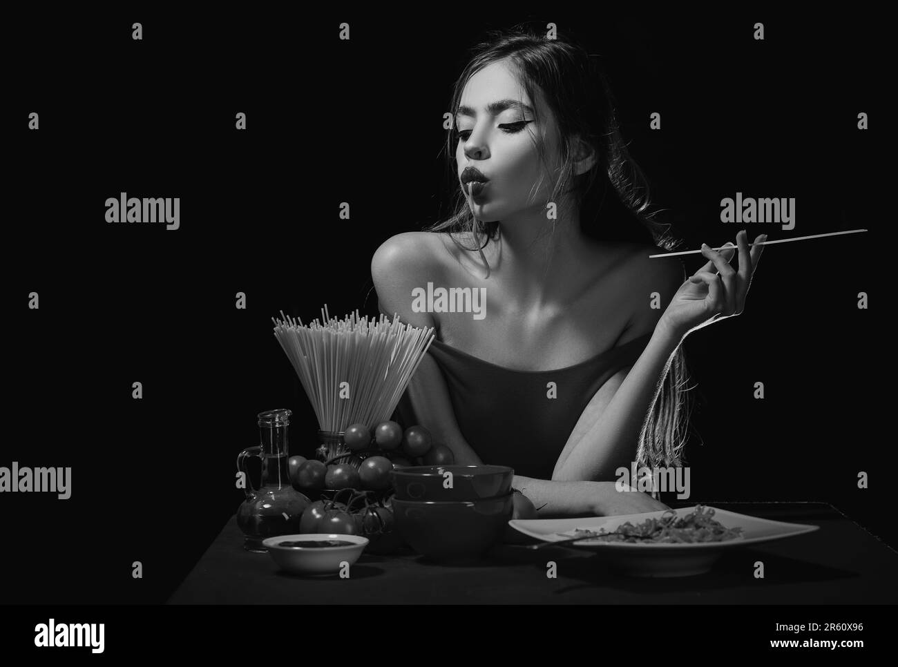 Sensual woman eat spaghetti. Healthy food concept. Hunger and appetite ...