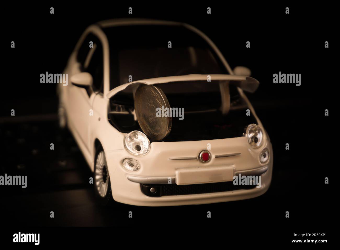 Car expenses illustration with miniature objects Stock Photo - Alamy