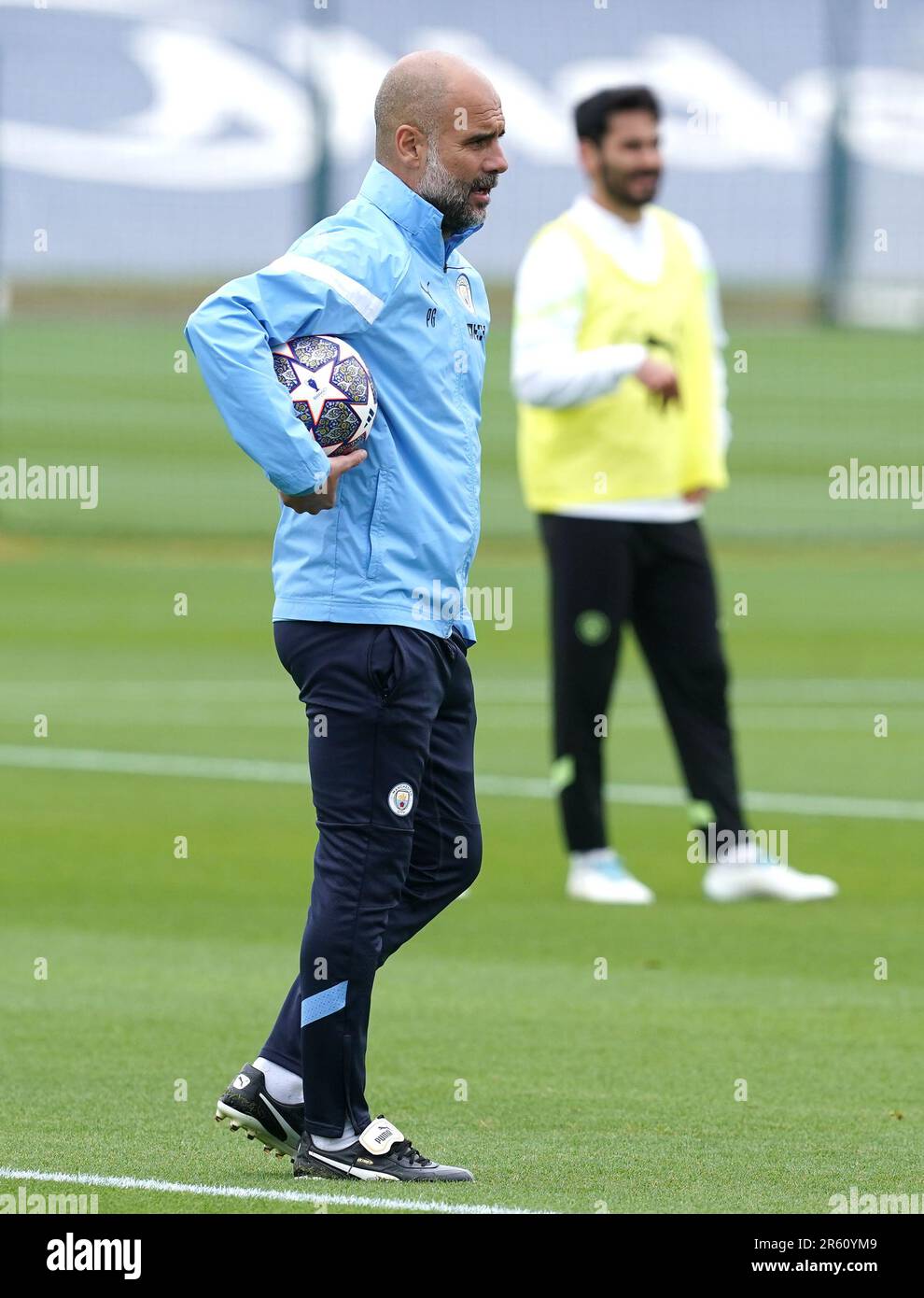 Manchester City manager Pep Guardiola (left) and Ilkay Gundogan during ...