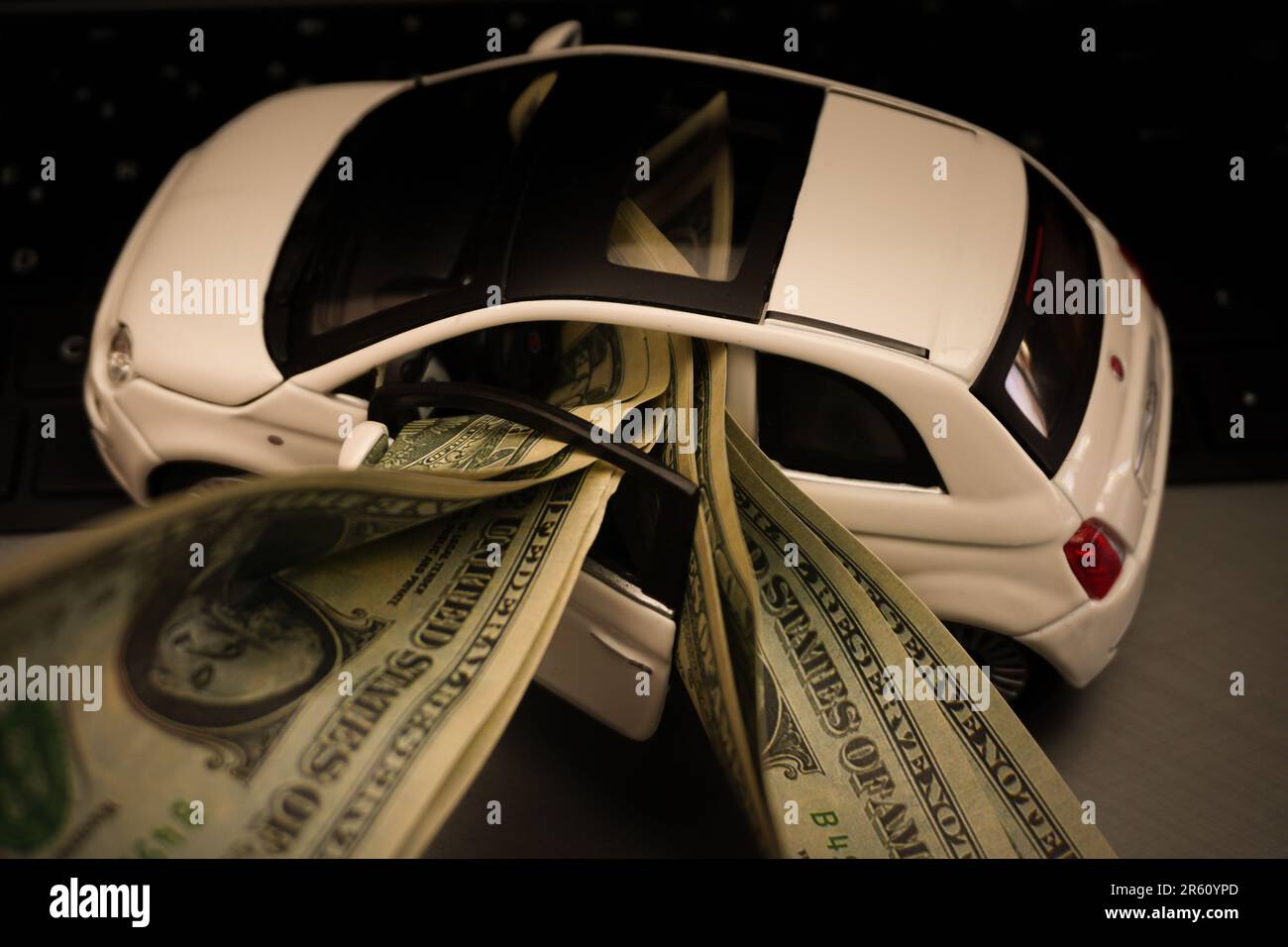 Car expenses illustration with miniature objects Stock Photo - Alamy