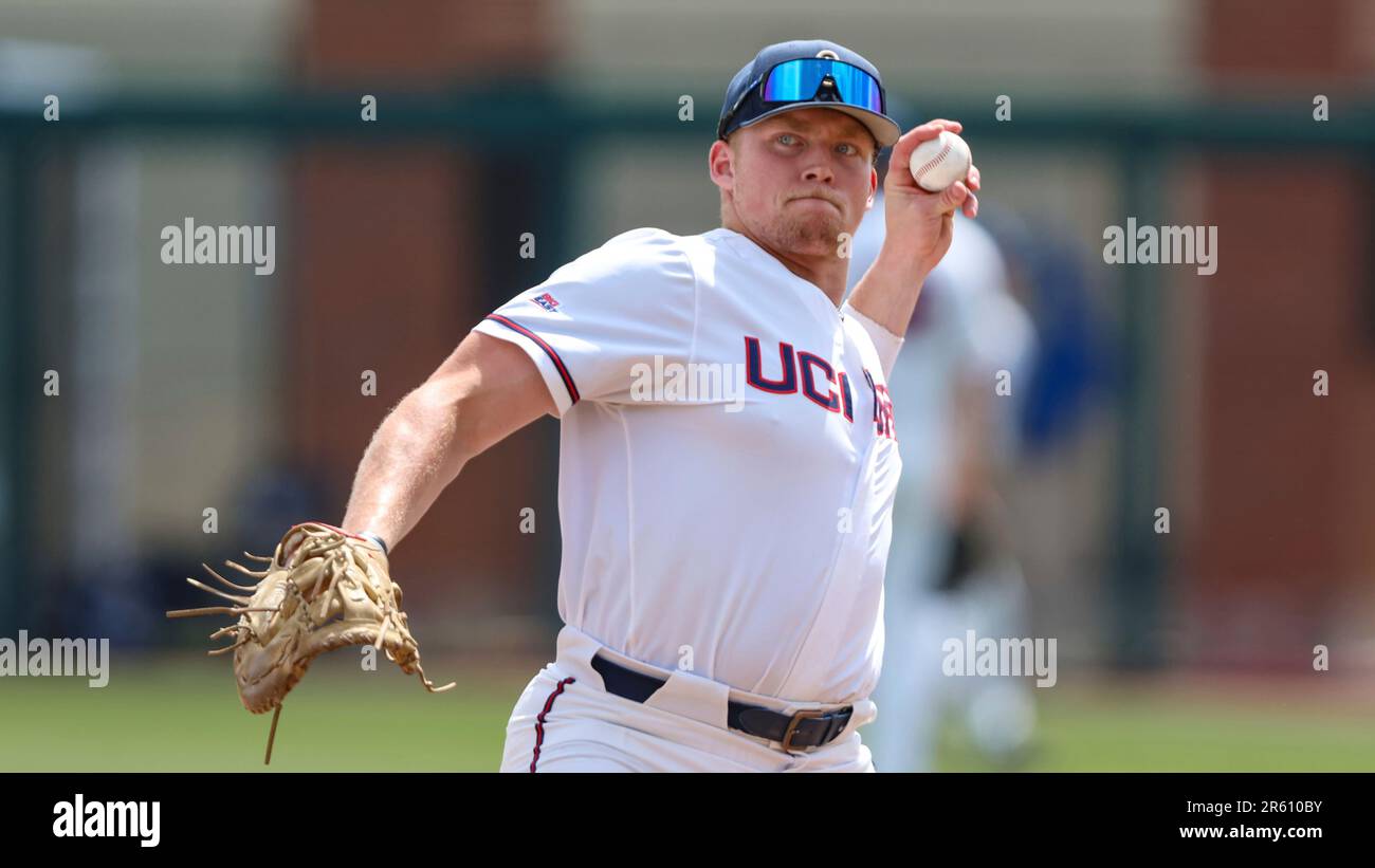 UConn first baseman Ben Huber (44) warms up before an NCAA baseball ...