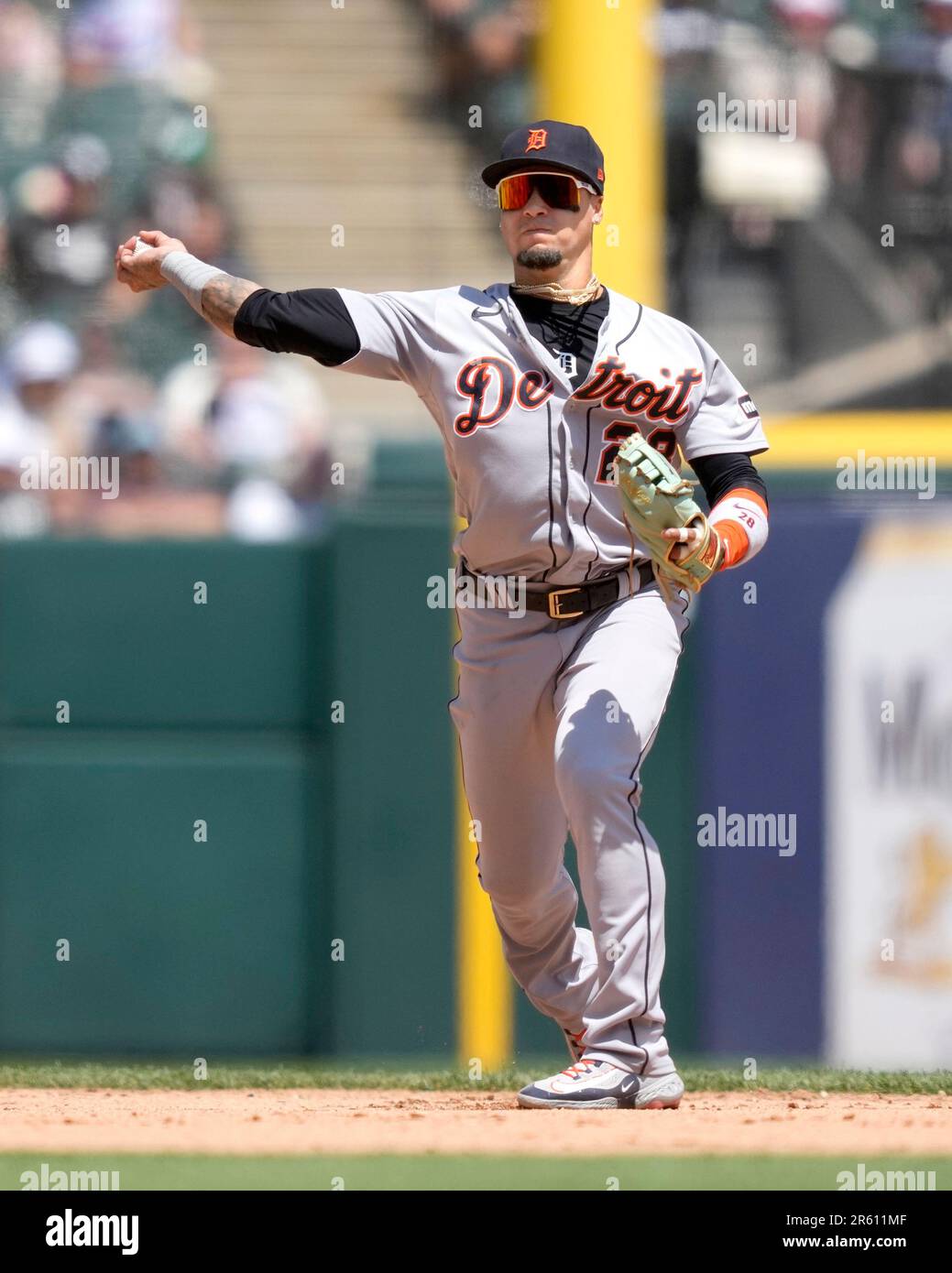 Detroit Tigers shortstop Javier Baez throws to first in a baseball game ...