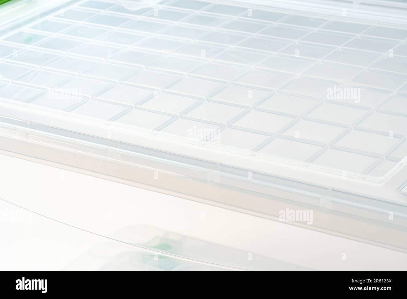 Transparent plastic box isolated on white background Stock Photo - Alamy