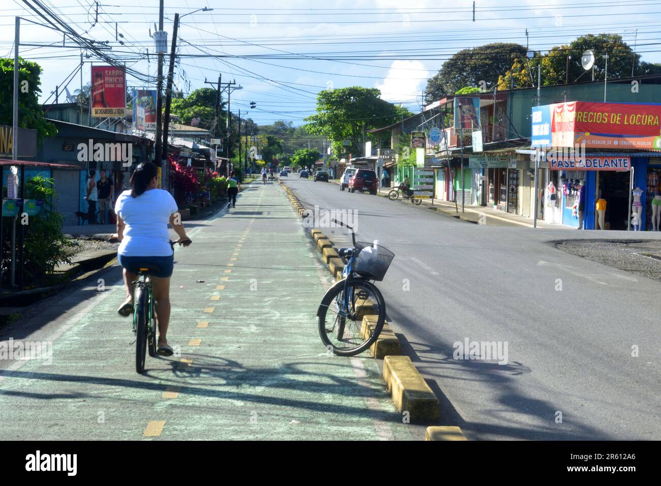 The central street of the small town of Puerto Jimenez, Osa Peninsula ...