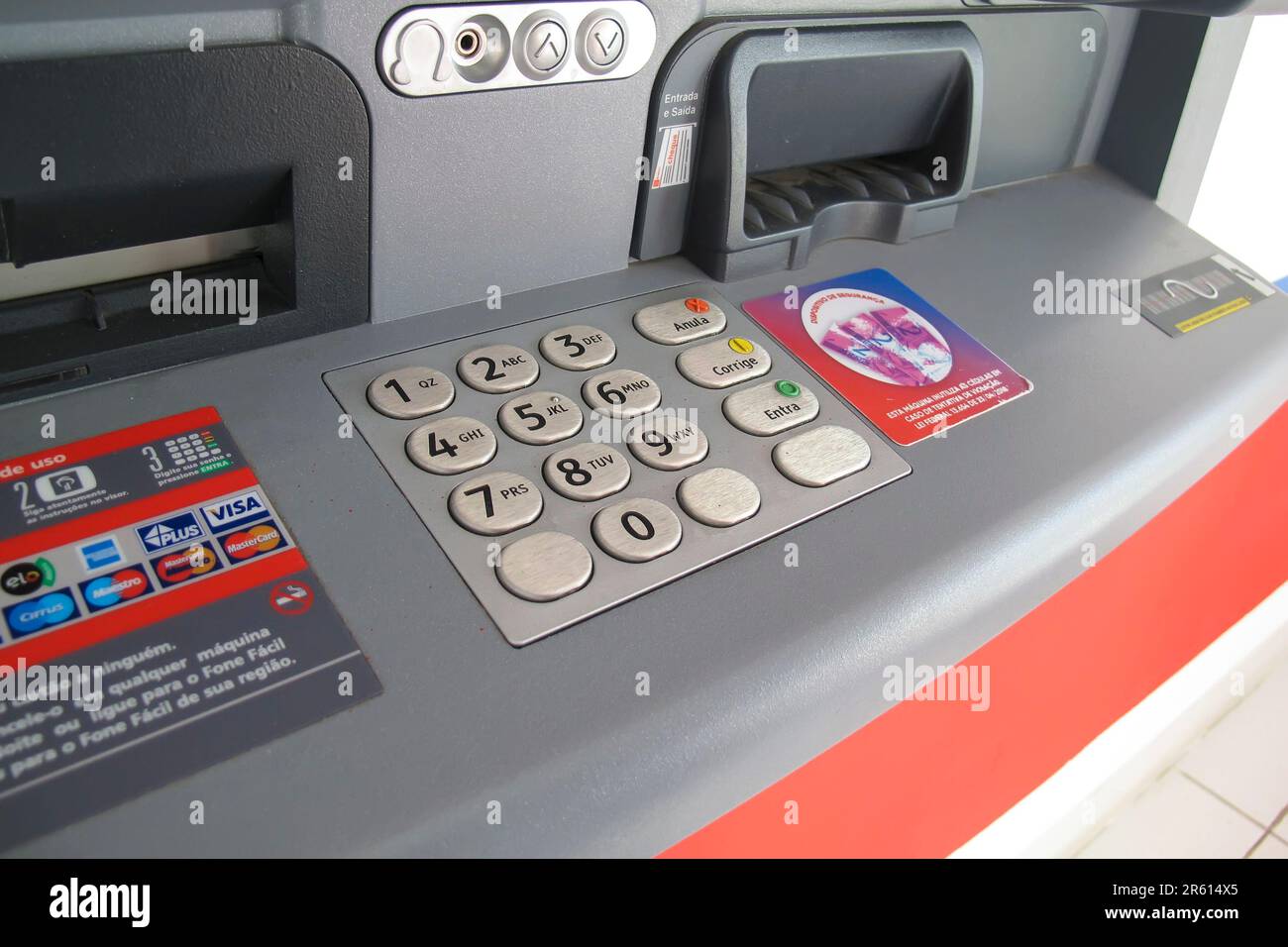 Minas Gerais, Brazil - February 24, 2023: detail on the use of an ATM ...