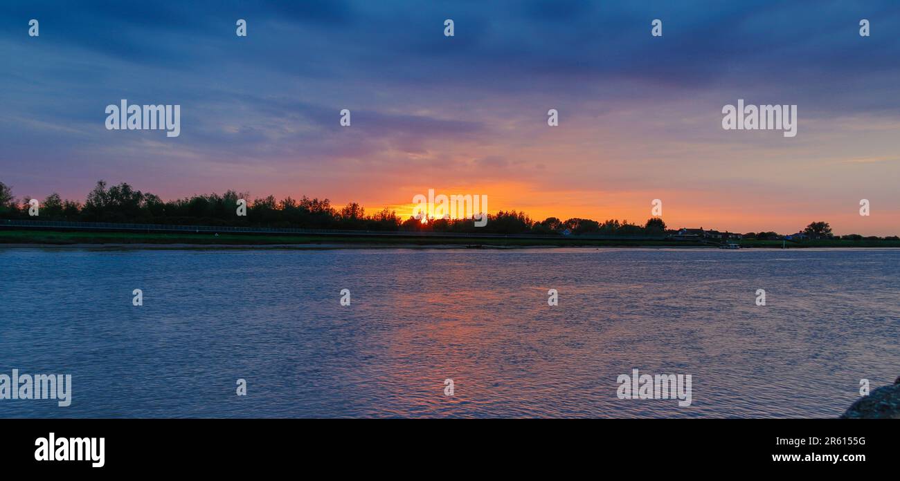 Sunset seen over the River Great Ouse in Kings Lynn, Norfolk. Taken ...