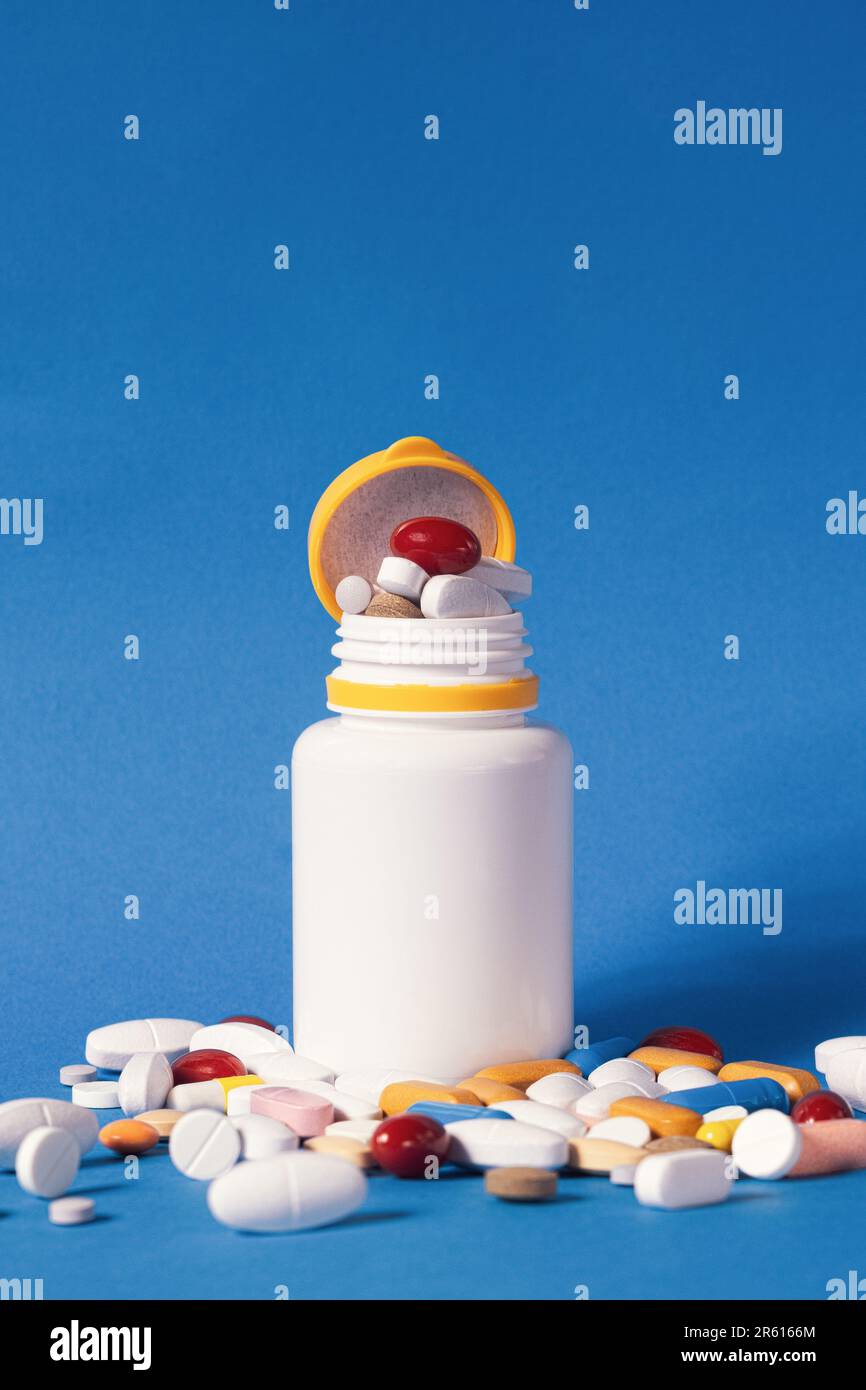 Closeup pill spilling from container hi-res stock photography and ...