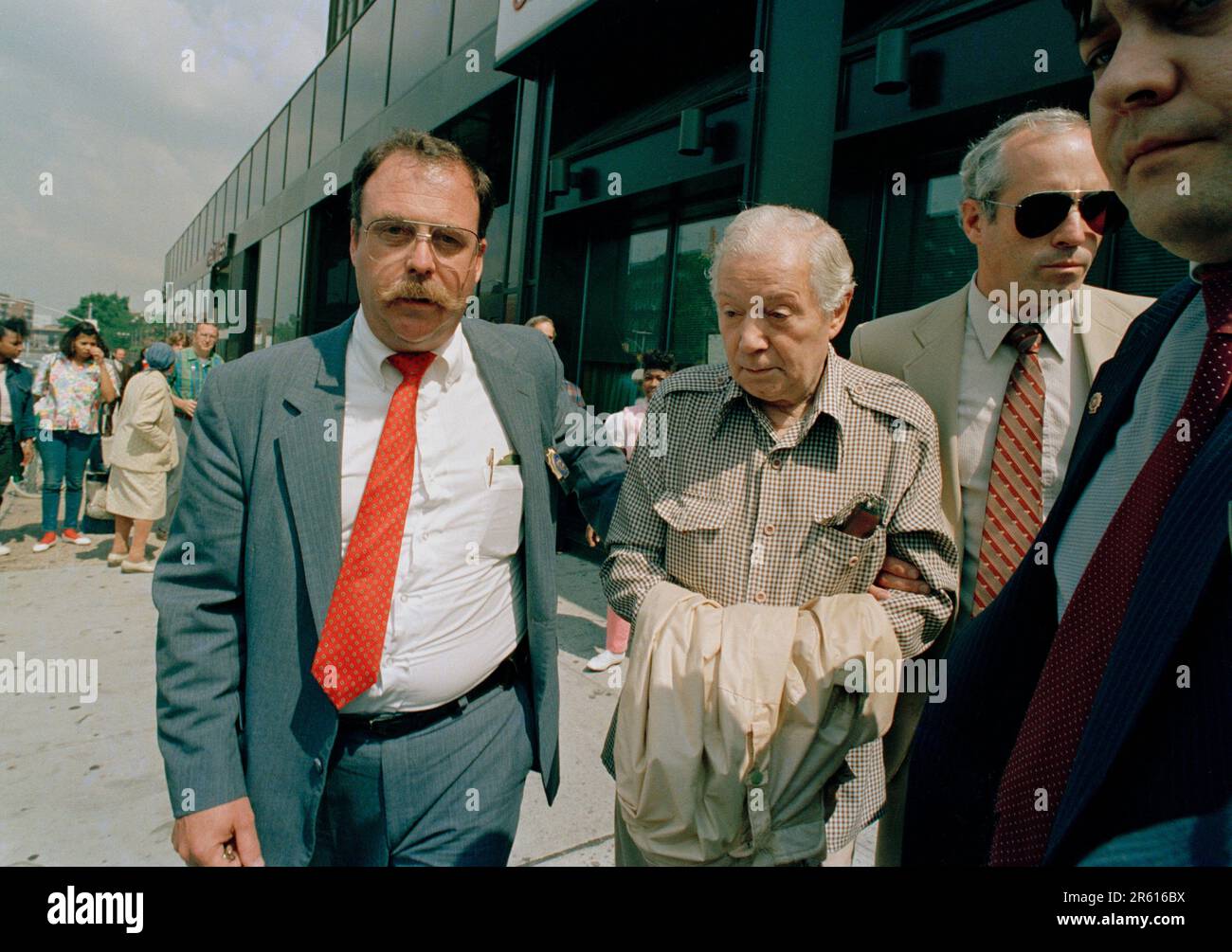 John Hogan, left, Assistant Director of the FBI New York office, holds ...
