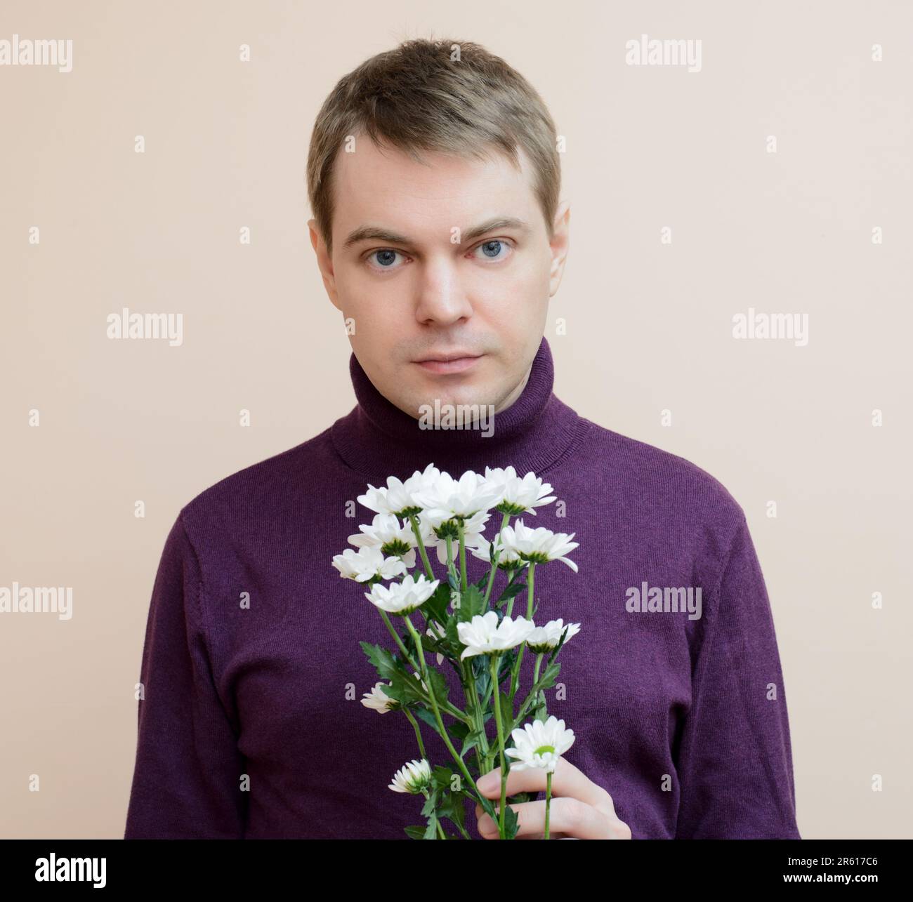 Male hand giving flowers hi-res stock photography and images - Alamy