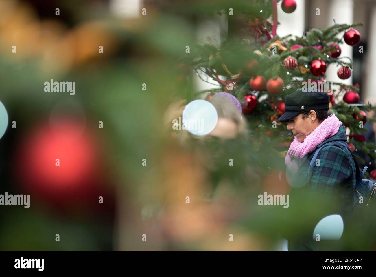 Christmassy decorations and outfits are seen in Covent Garden, central ...