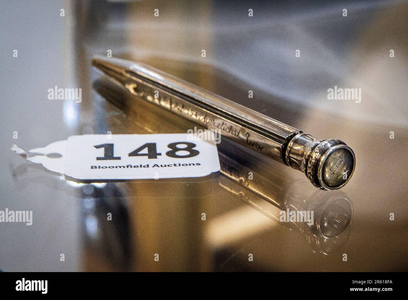 A silver-plated pencil purported to have belonged to Adolf Hitler which ...