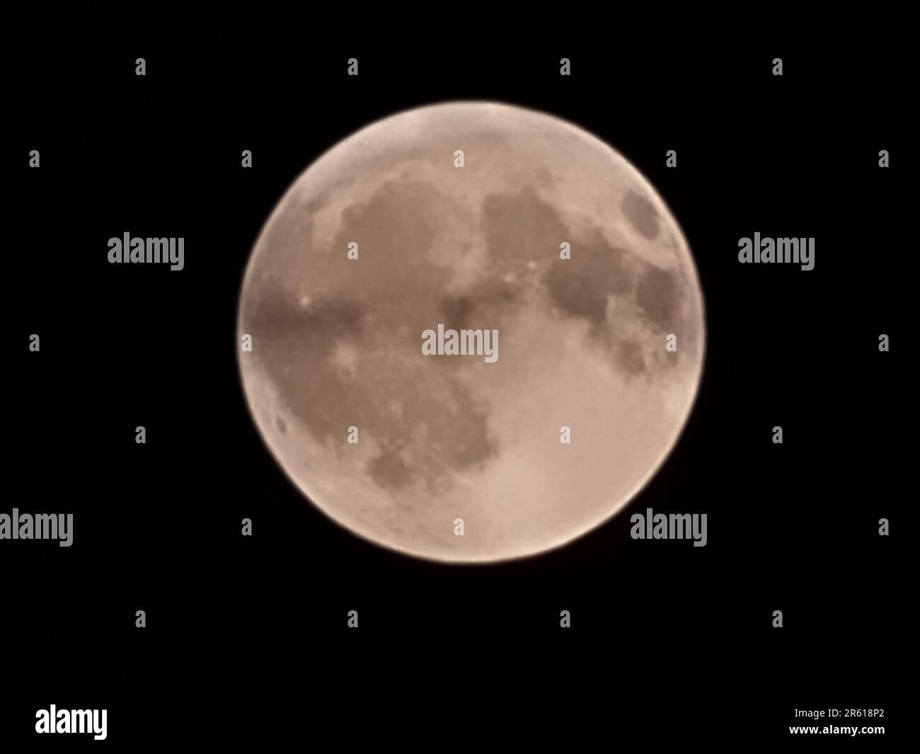 A clear night sky illuminated by a full moon Stock Photo - Alamy
