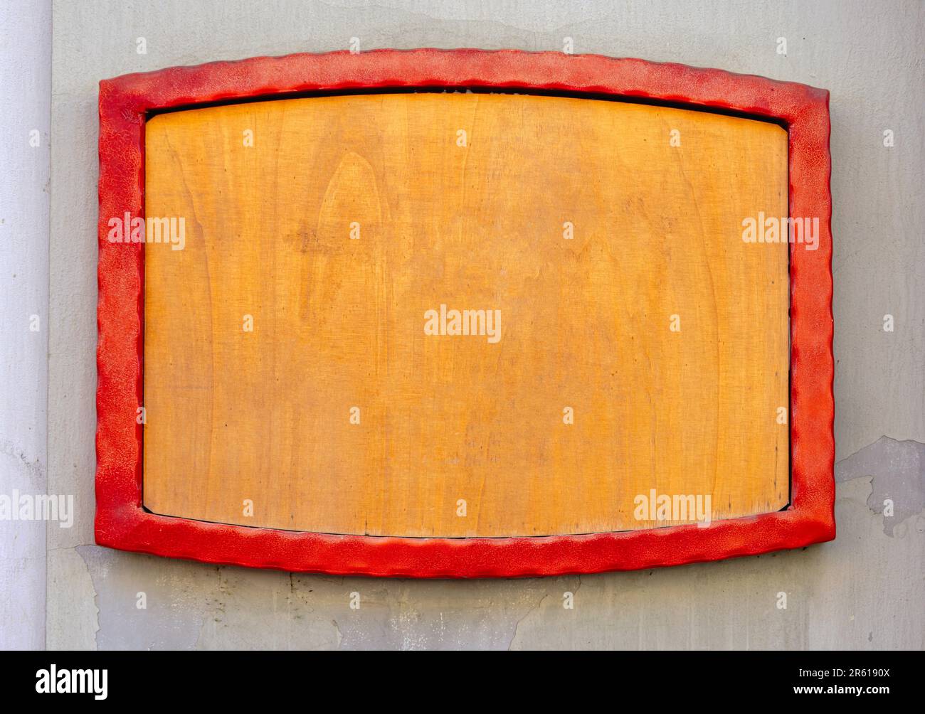 Red Metal Frame With Wooden Board Insert at Wall Copy Space Stock Photo ...