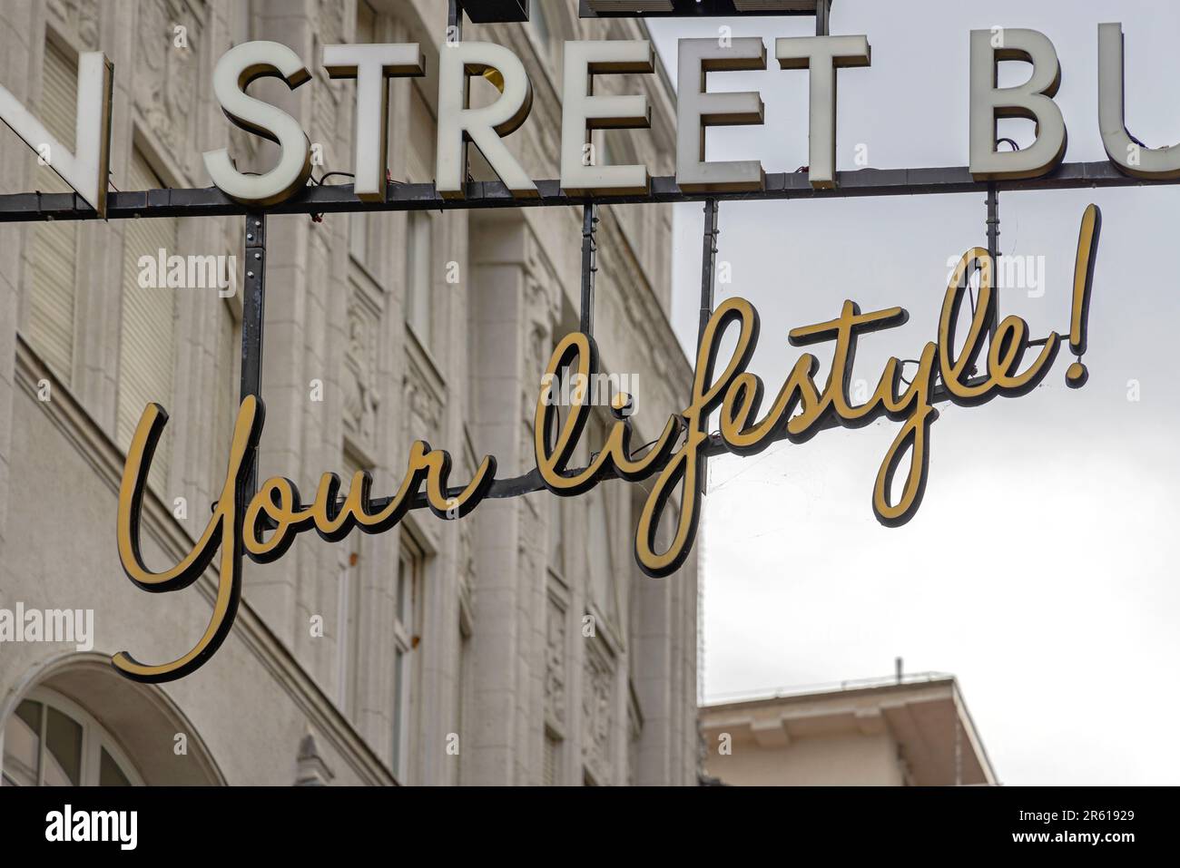 3d Signs Your Lifestyle Hanging Over Fashion Street Stock Photo - Alamy