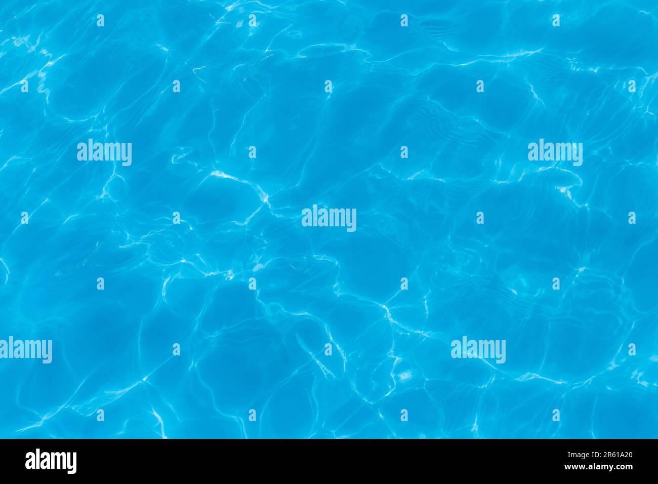 Blue clear pool water with abstract pattern of reflection and wave ...